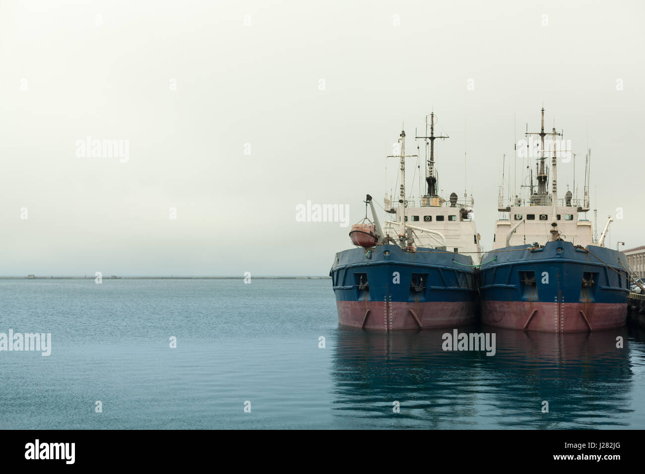two ship in sea port Stock Photo - Alamy
