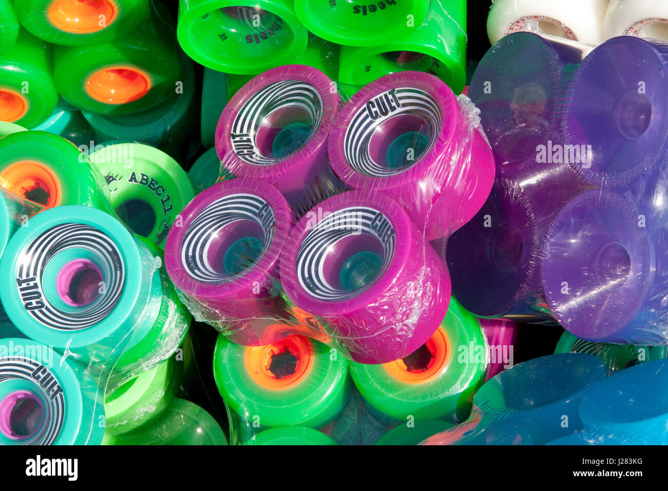 Brightly coloured/colored packs of skateboard wheels Stock Photo - Alamy