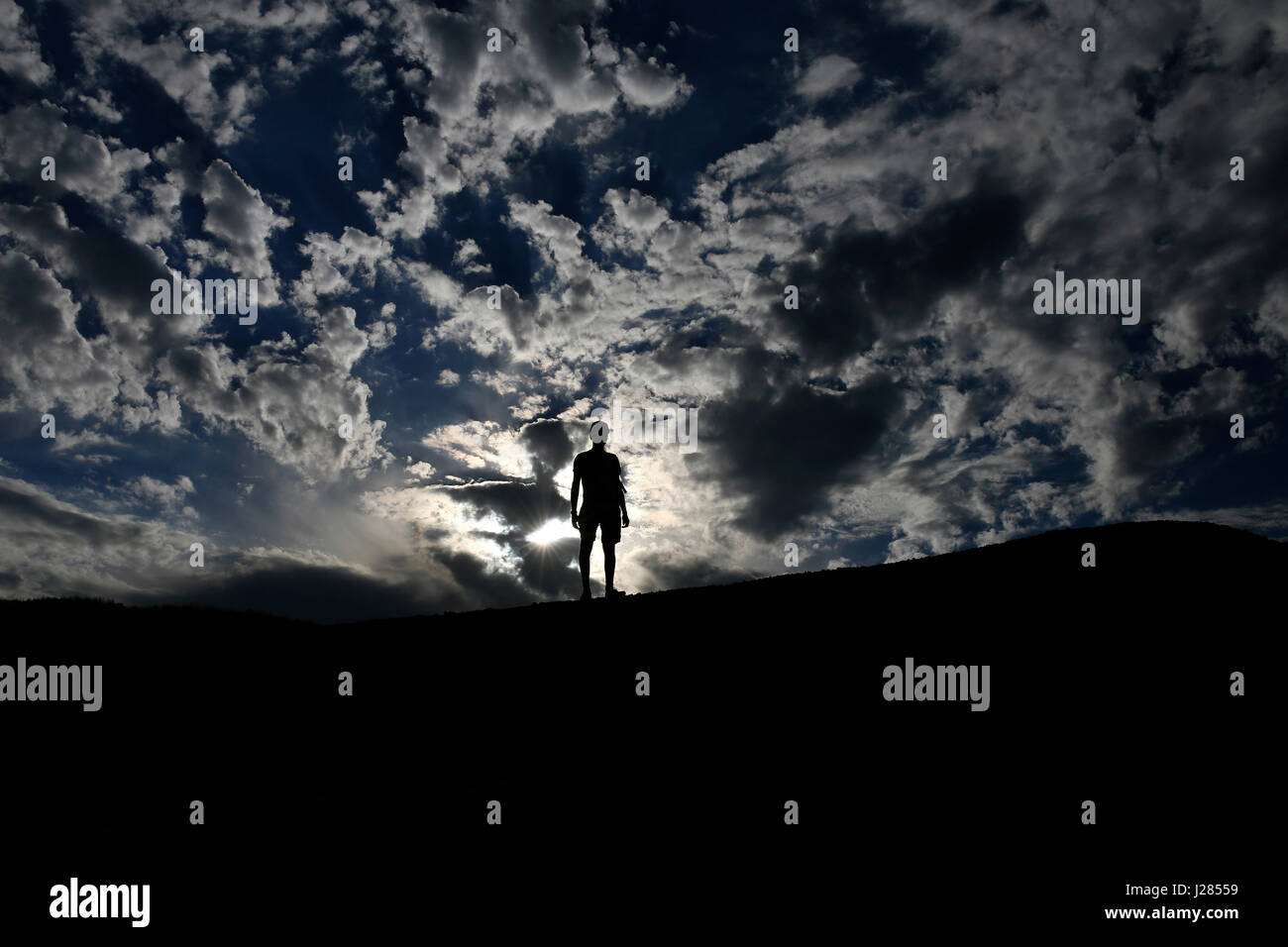 Man silhouette standing back hi-res stock photography and images - Alamy
