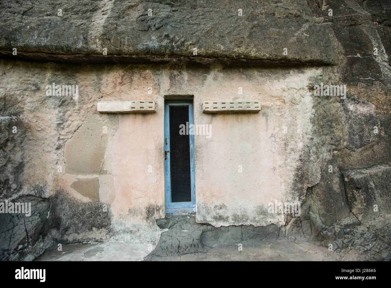 A simple cell door entrance, perhaps to a monk's romm at Ajanta ...