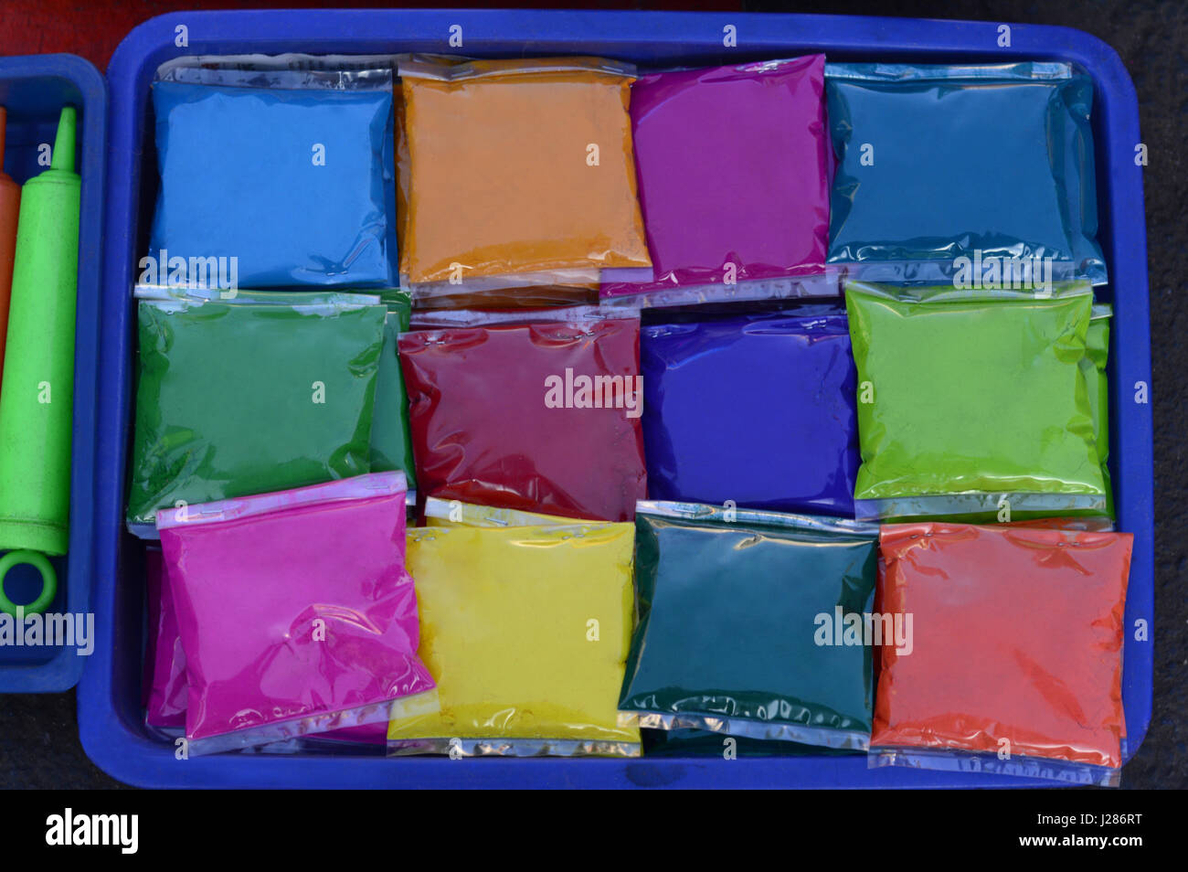 Powder color packets for sale in Pune, Maharashtra Stock Photo - Alamy