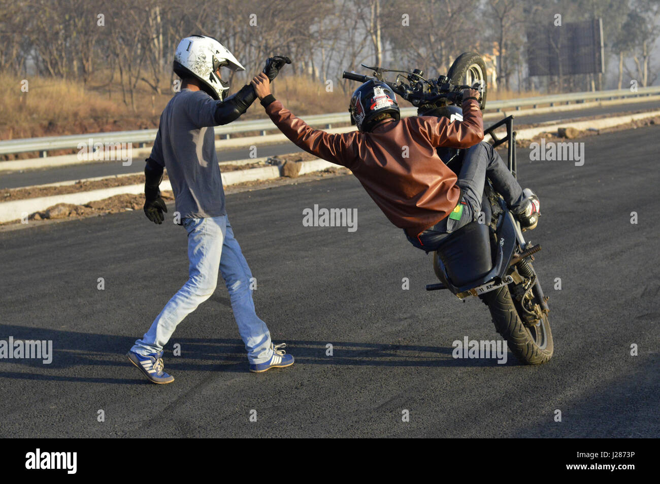Motorcycle stunt road hi-res stock photography and images - Alamy