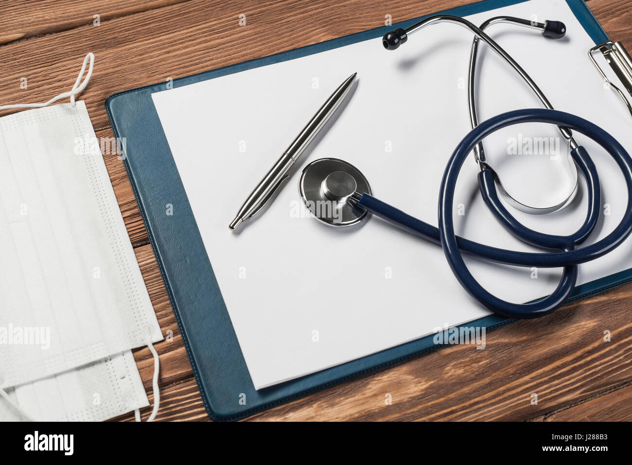 Desk of doctor with medicine things Stock Photo - Alamy