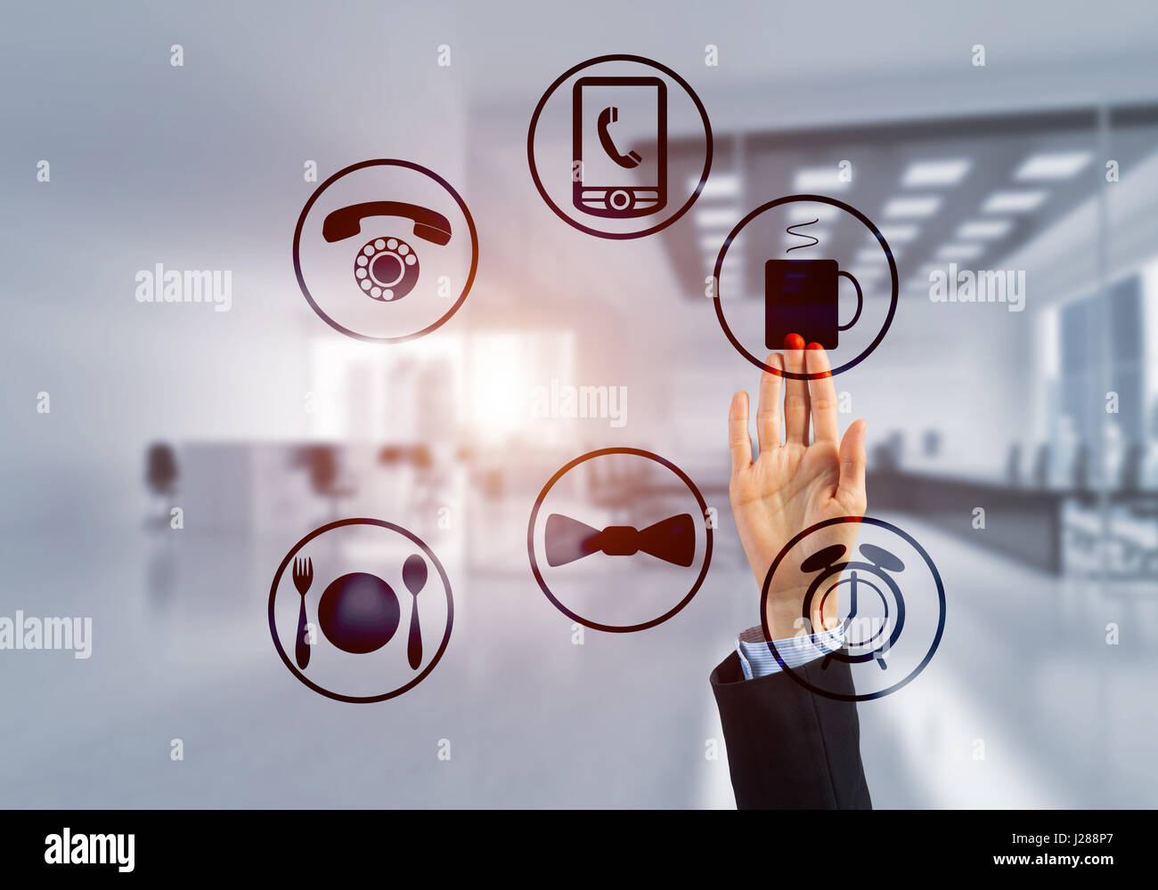 Modern office interior and close of businesswoman hand choosing symbol ...
