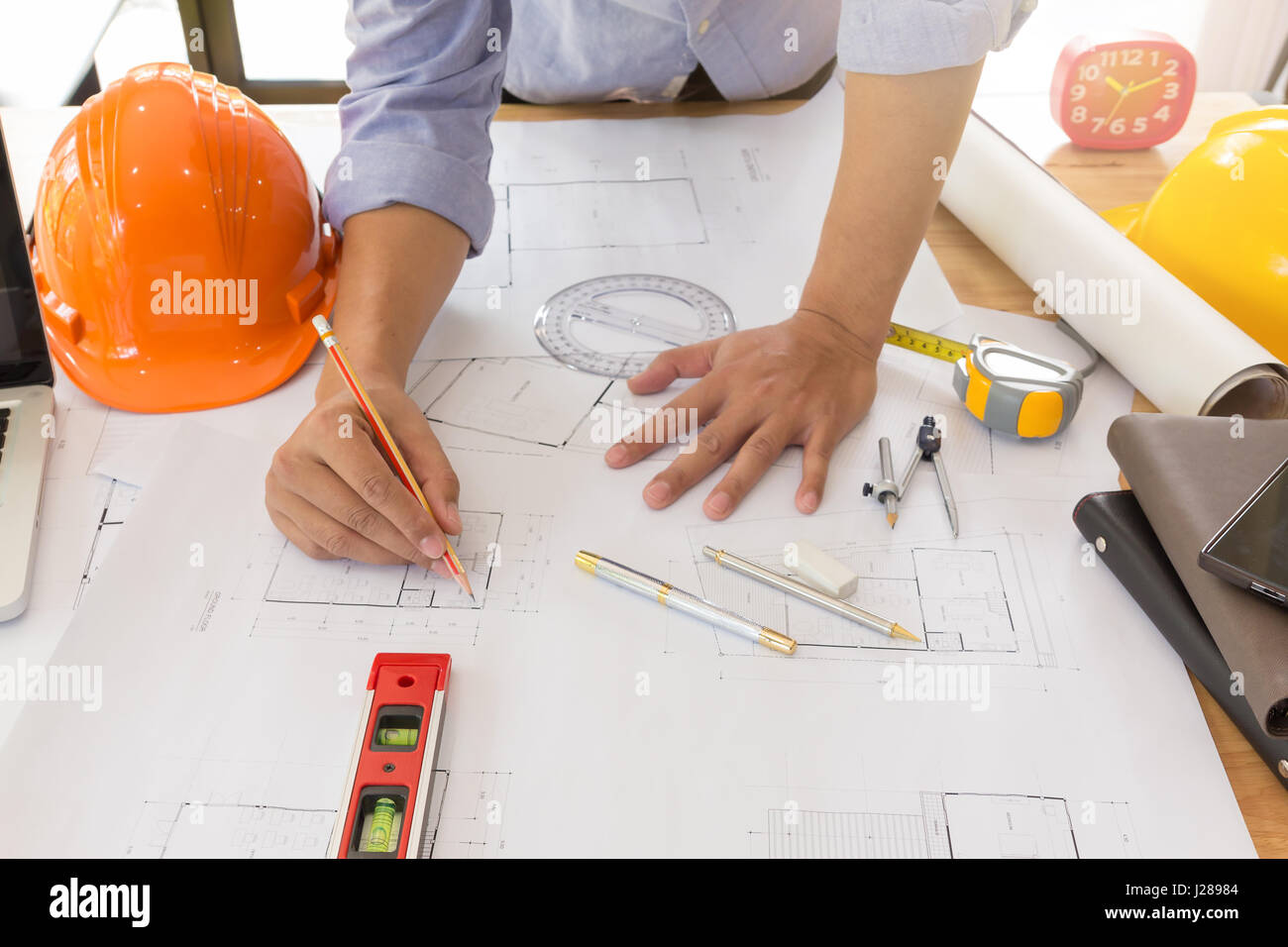 Architect concept, Architects office working with blueprints Stock ...