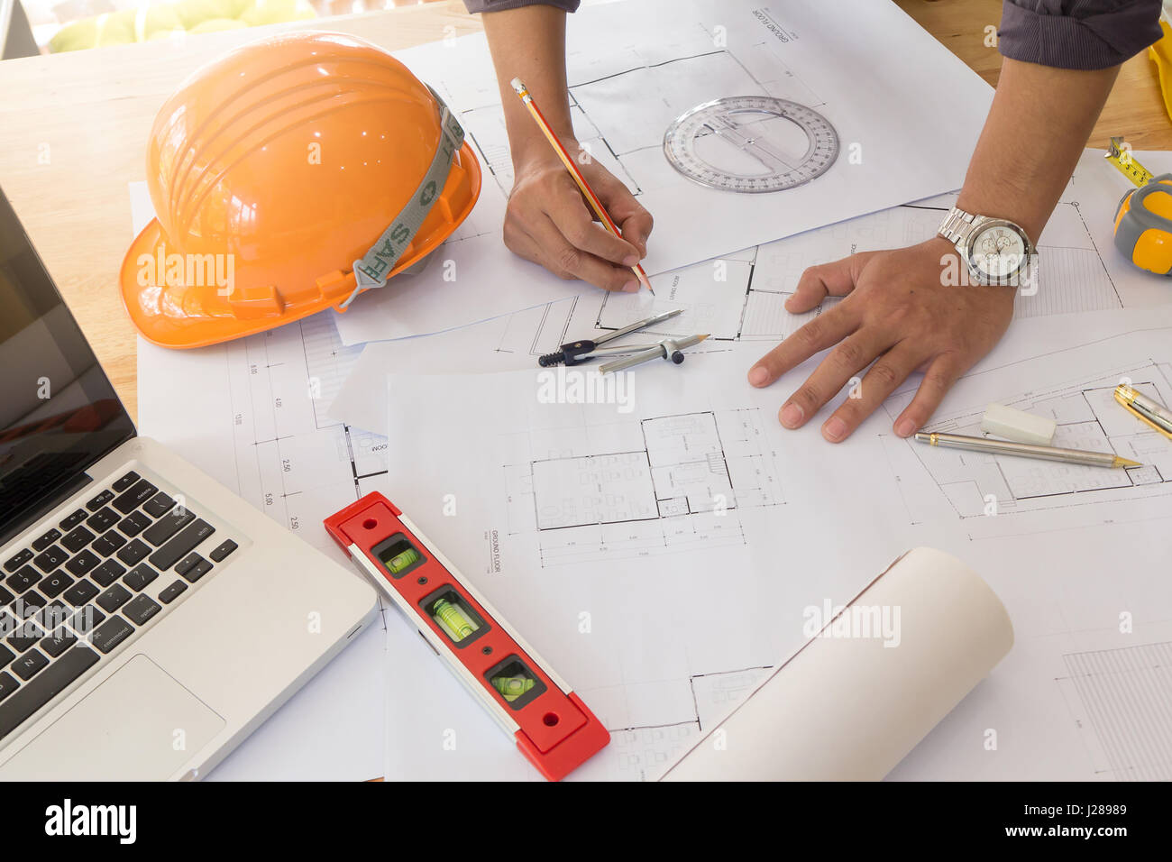 Architect concept, Architects office working with blueprints Stock ...