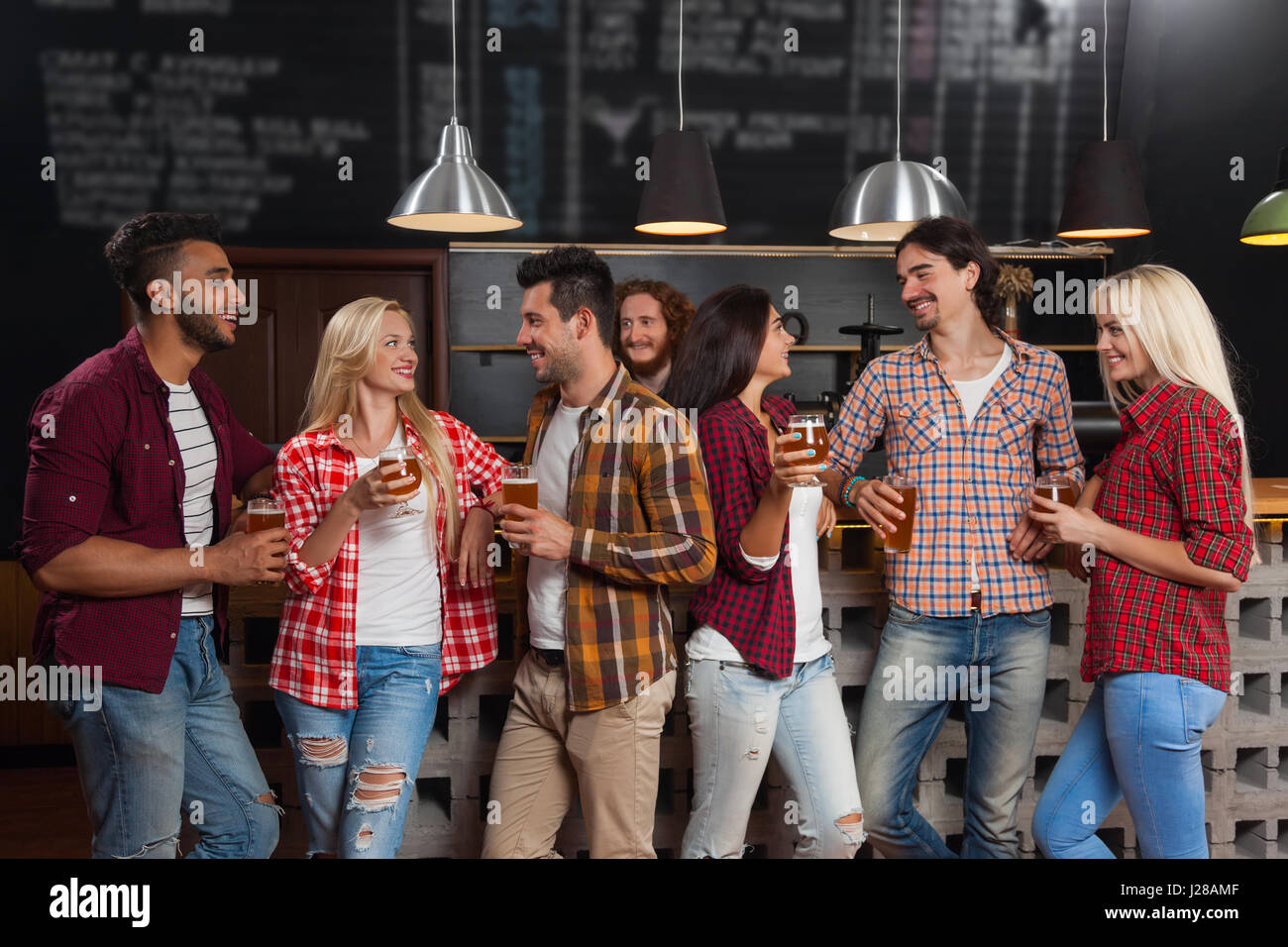 Young People Group In Bar, Happy Smiling Friends Pub, Drink Beer ...