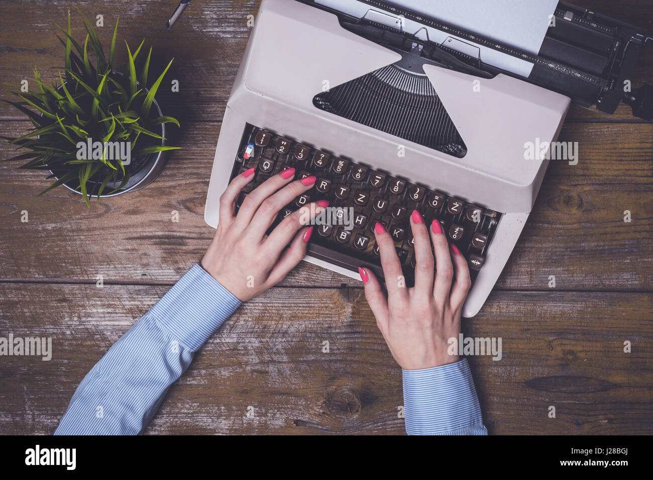 Hands on typewriter hi-res stock photography and images - Alamy
