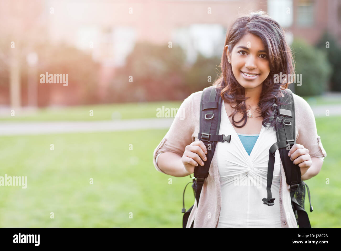 A portrait of a happy asian student on campus Stock Photo - Alamy