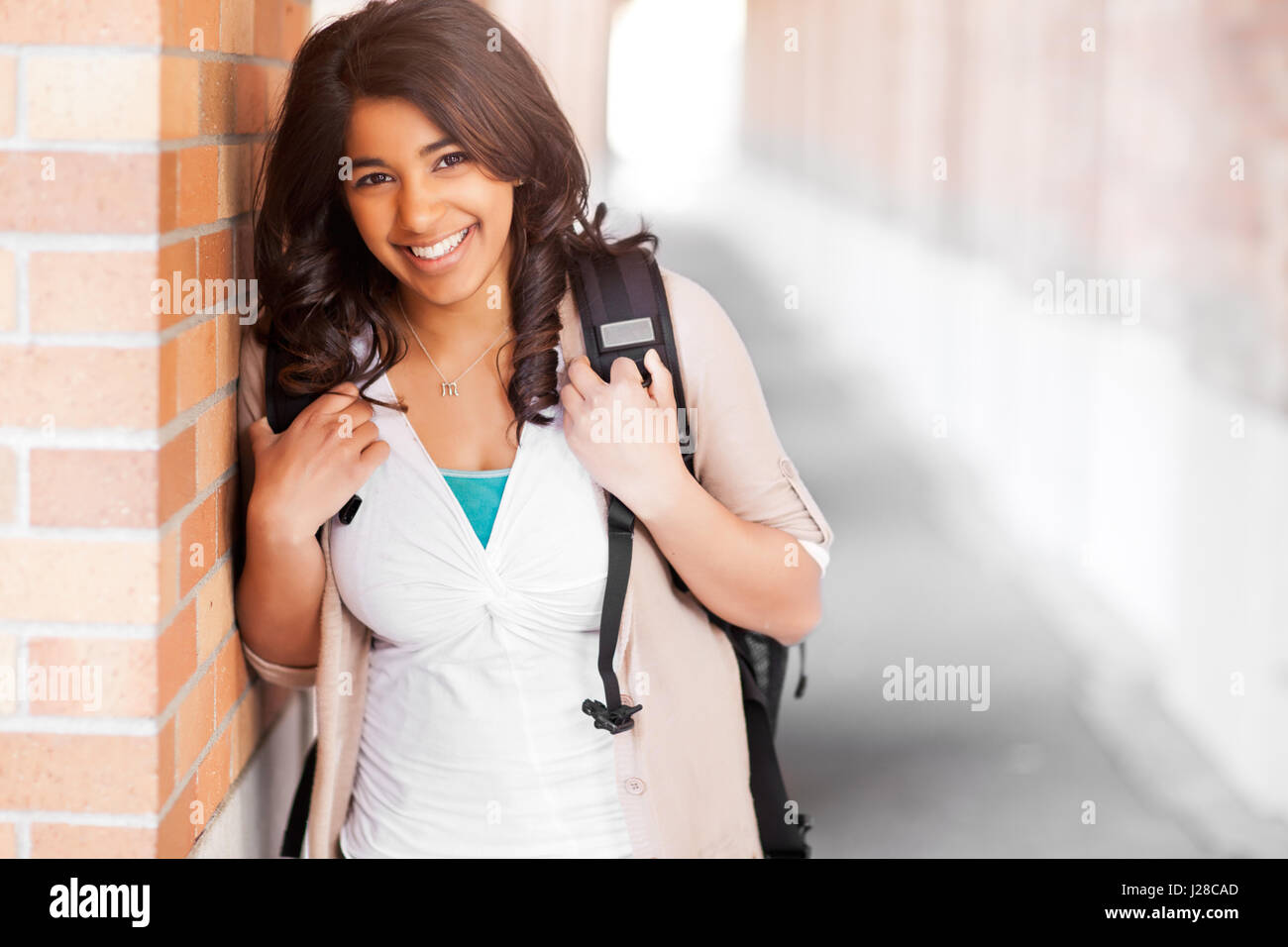 A portrait of a happy asian student on campus Stock Photo - Alamy