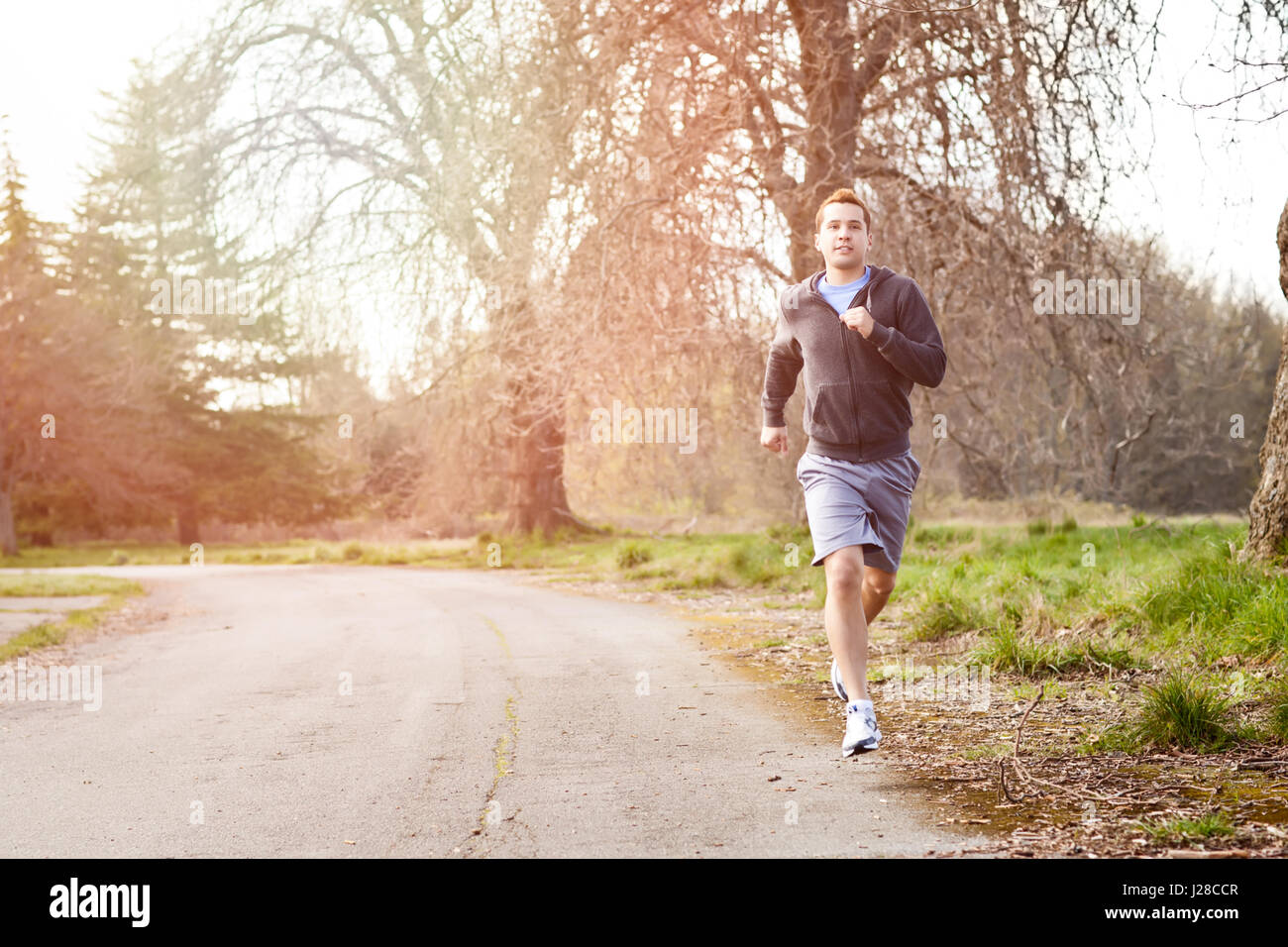 A shot of a mixed race man running outdoor Stock Photo - Alamy