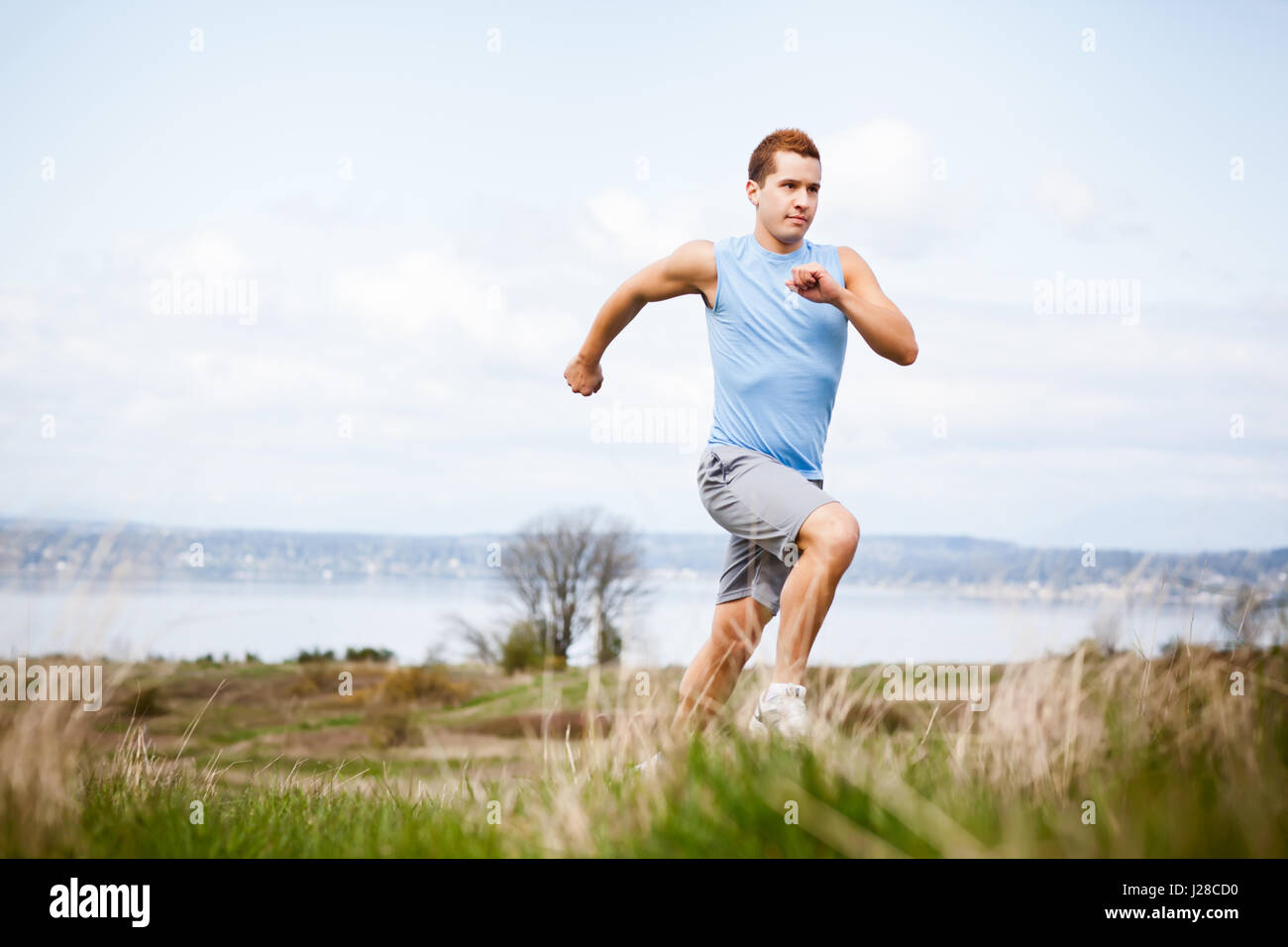 A shot of a mixed race man running outdoor Stock Photo - Alamy