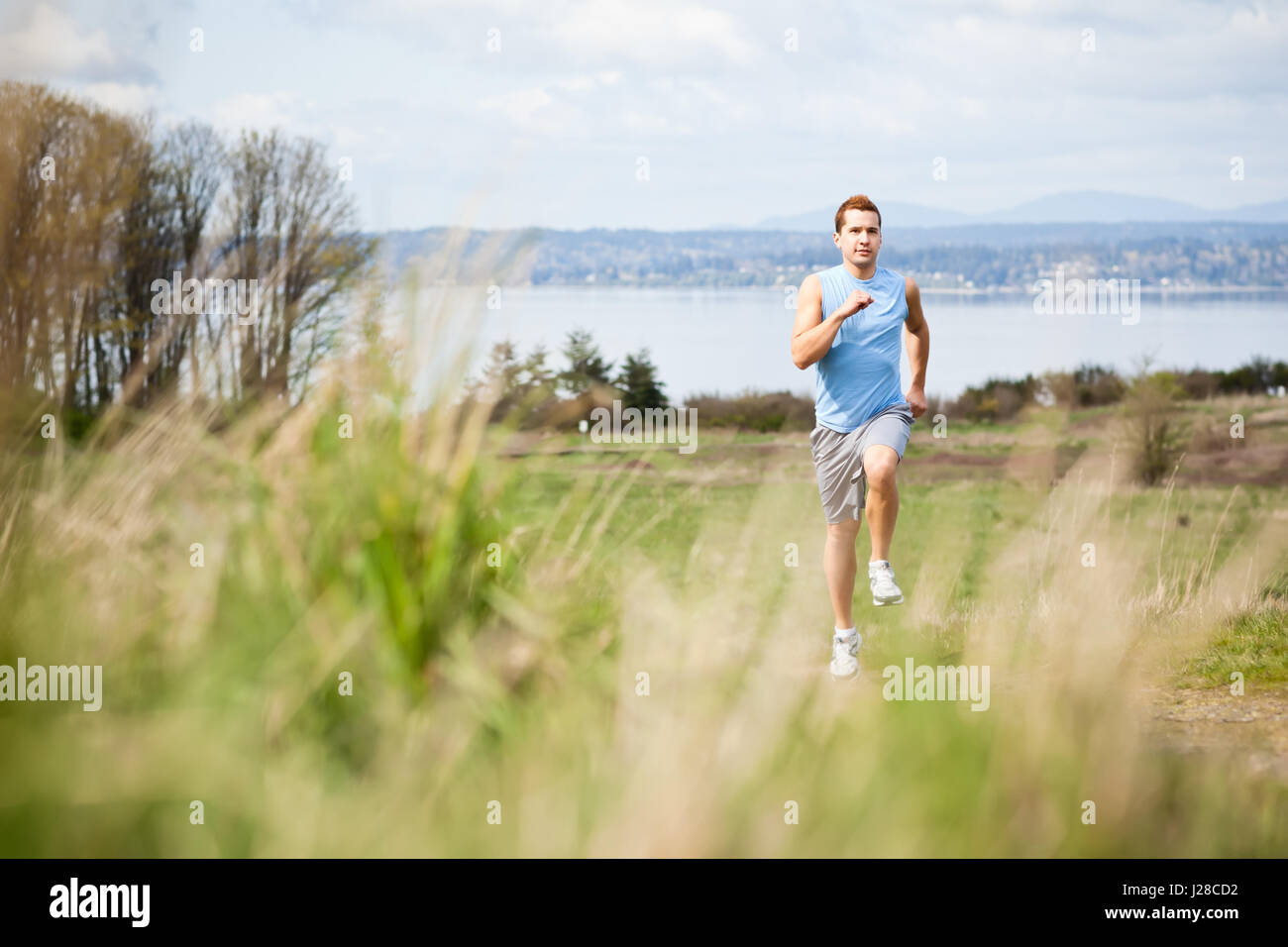 A shot of a mixed race man running outdoor Stock Photo - Alamy