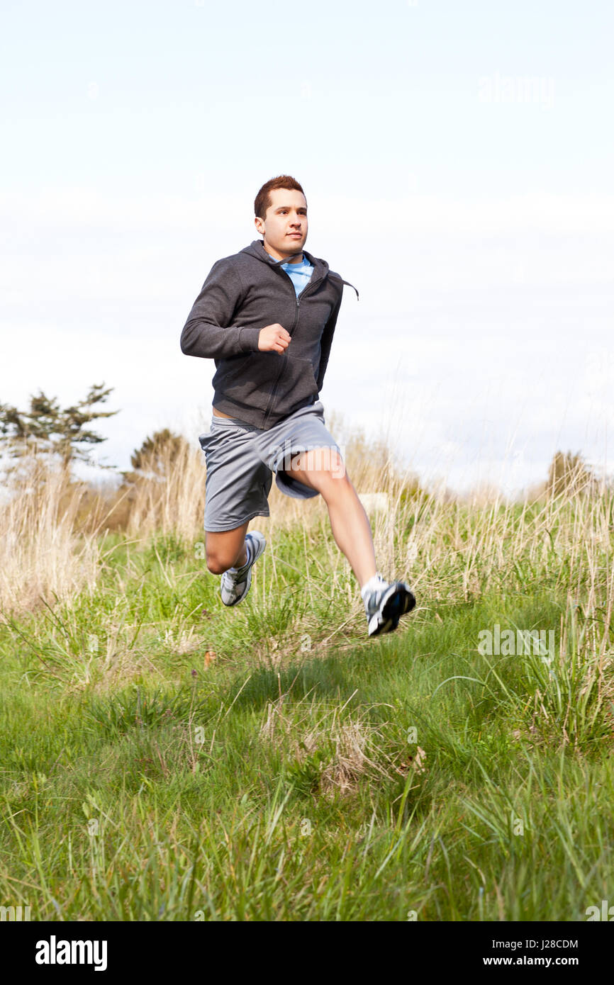A shot of a mixed race man running outdoor Stock Photo - Alamy