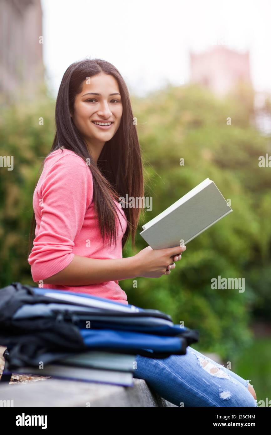 A portrait of a hispanic college student at campus Stock Photo - Alamy