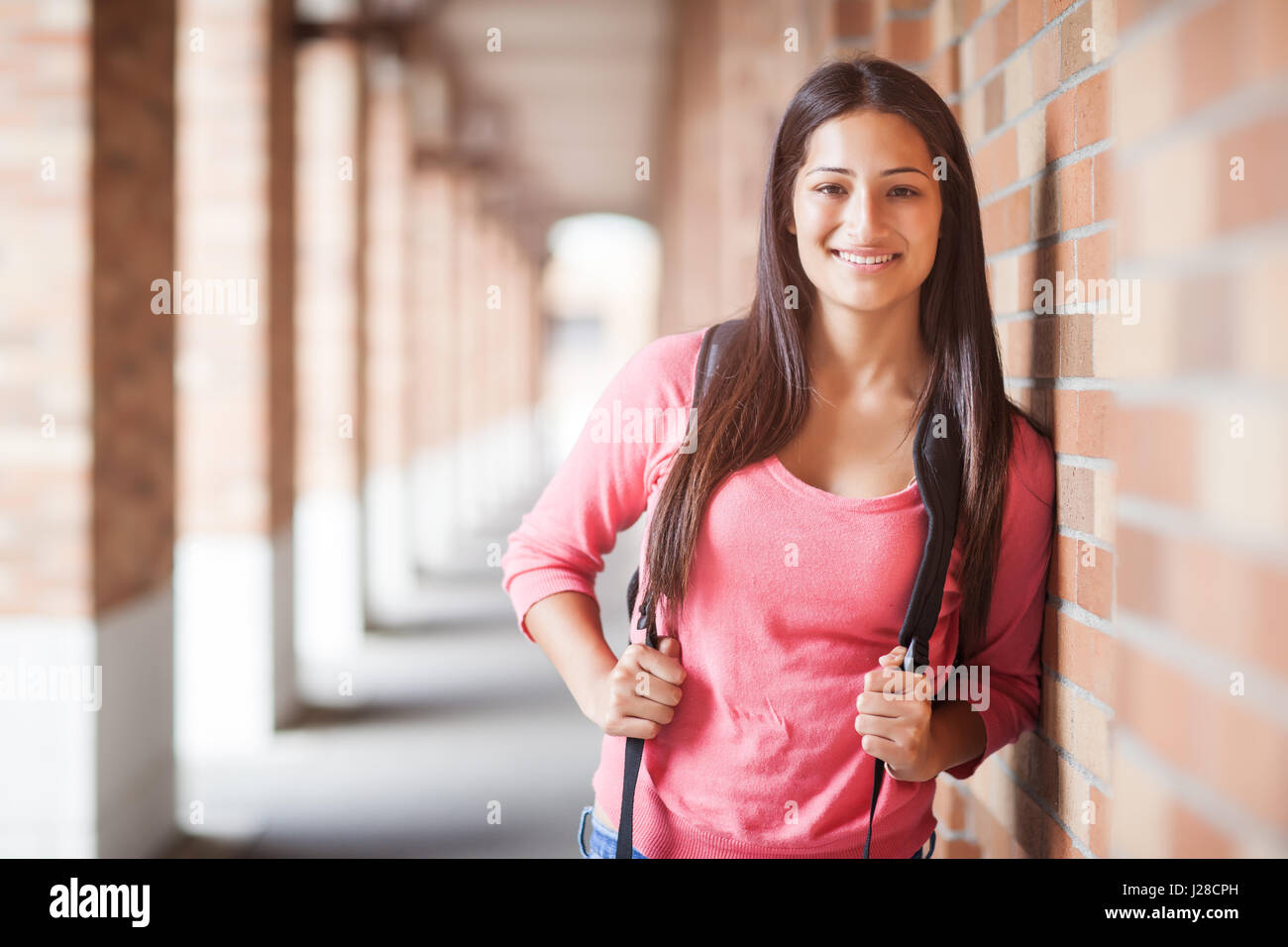 A portrait of a hispanic college student at campus Stock Photo - Alamy