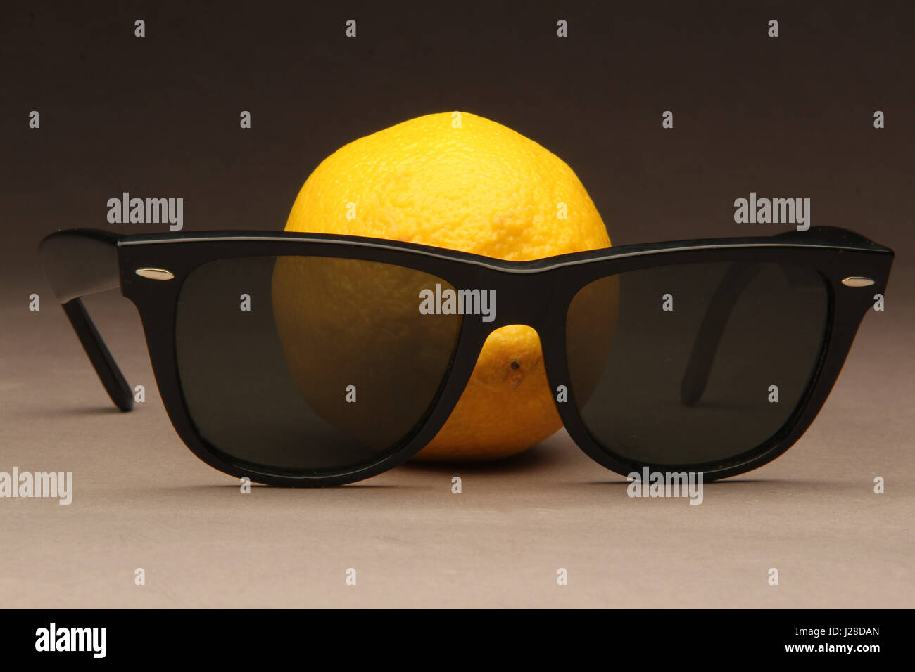 Lemon Wearing Sunglasses Stock Photo - Alamy