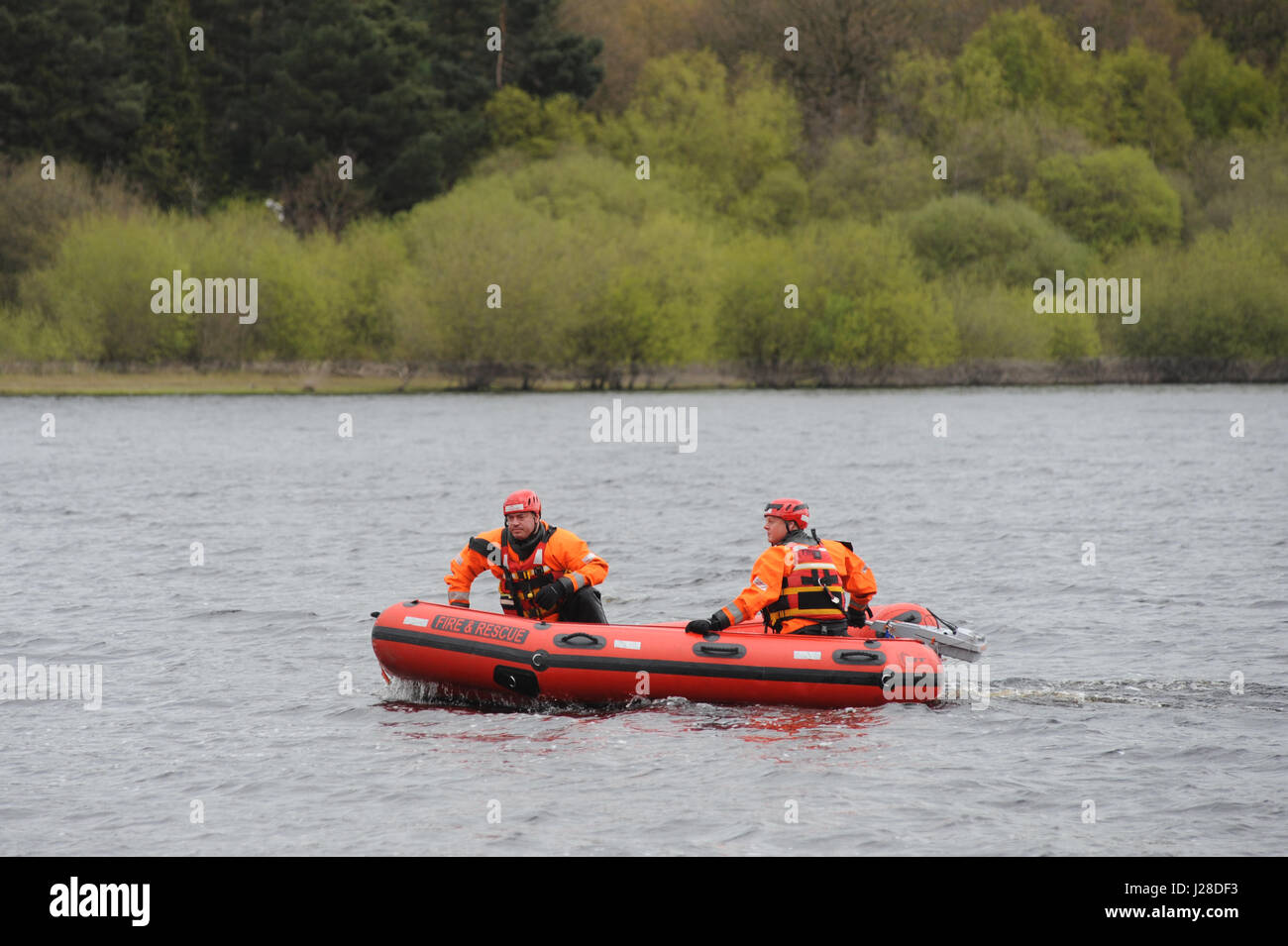 A man being rescued by firefighters during a training exercise at ...