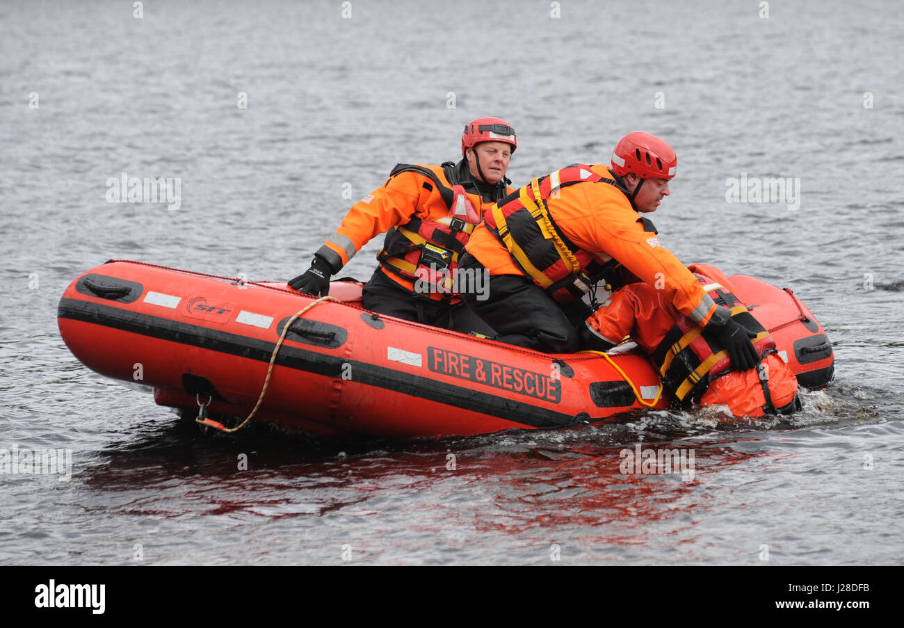 A man being rescued by firefighters during a training exercise at ...