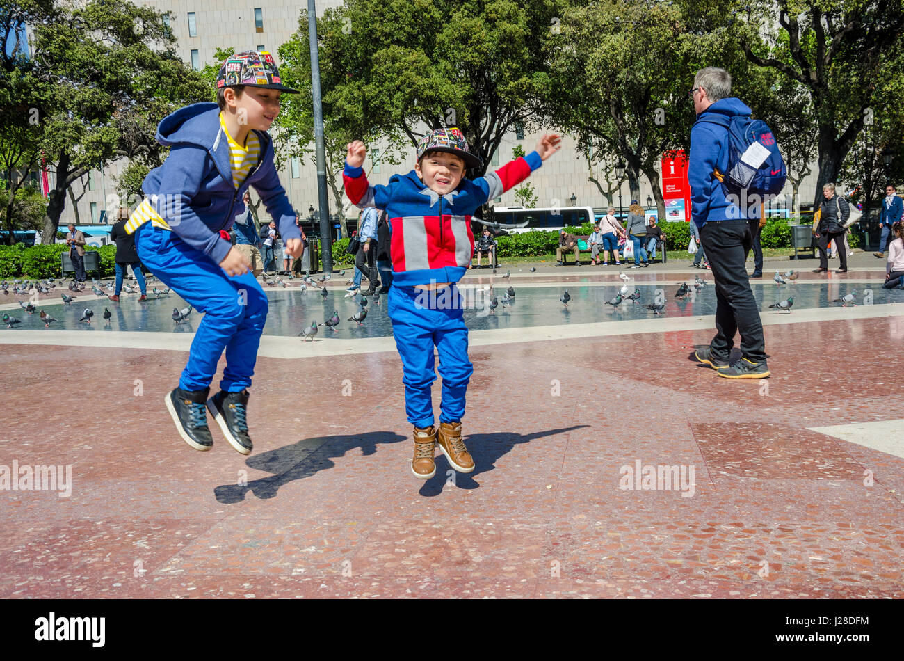 Boys jumping hi-res stock photography and images - Alamy