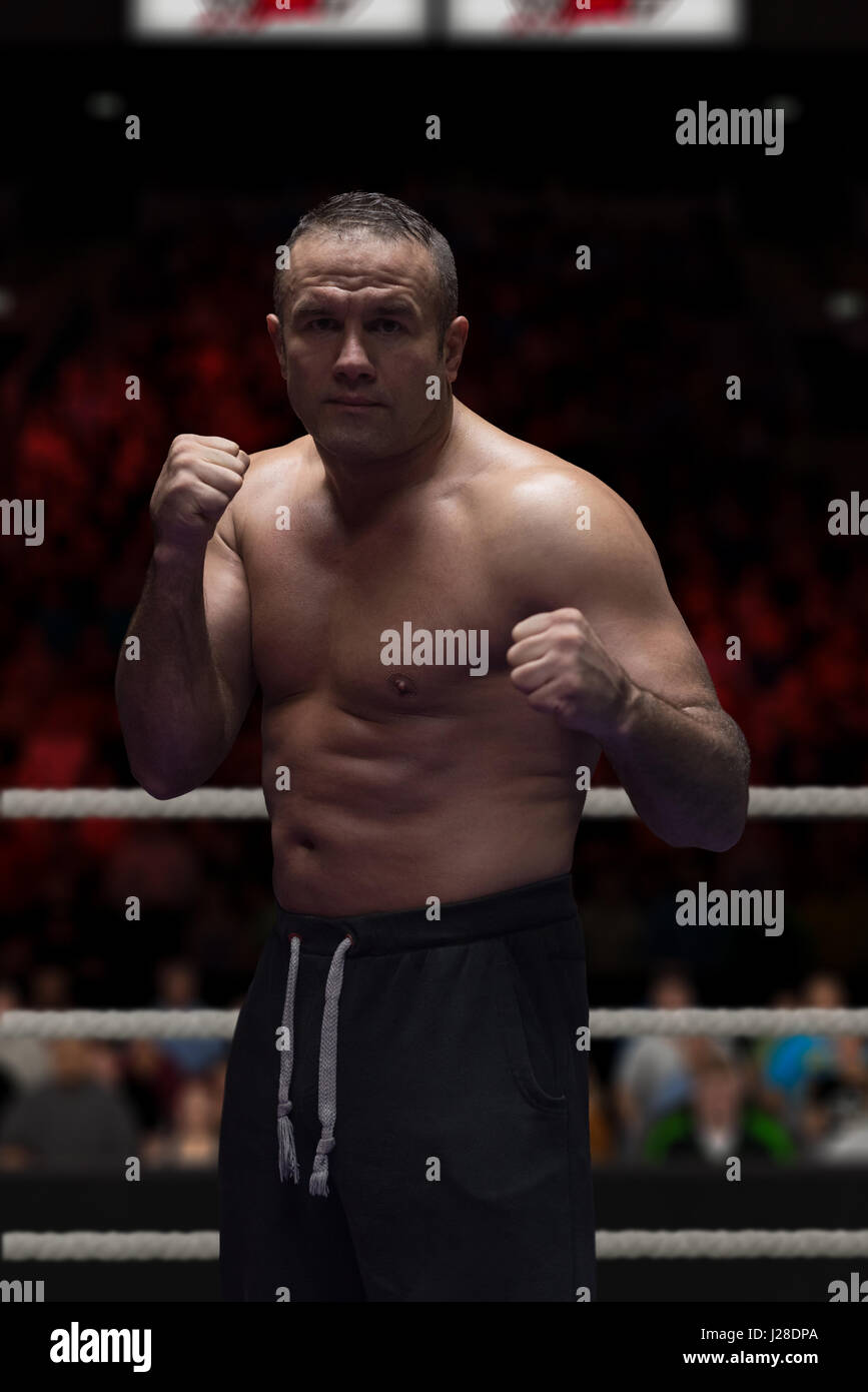 professional kickboxer with hands in martial arts position training for ...