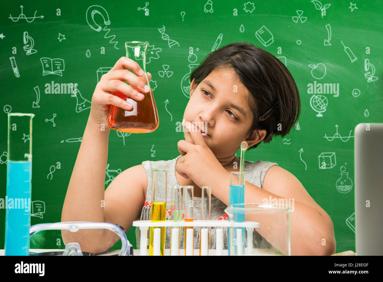 Indian kids doing science hi-res stock photography and images - Alamy