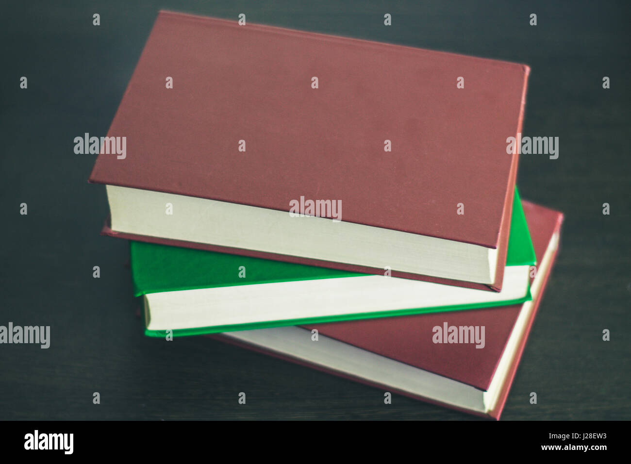 Closeup three books on hi-res stock photography and images - Alamy