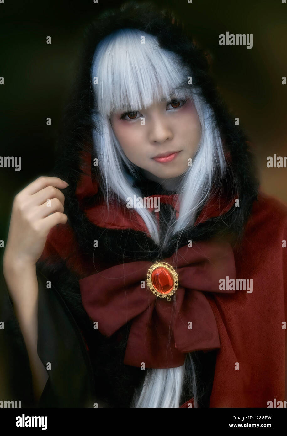 Cosplay girl. Comic Con girl. Portrait of a girl dressed as Little Red ...