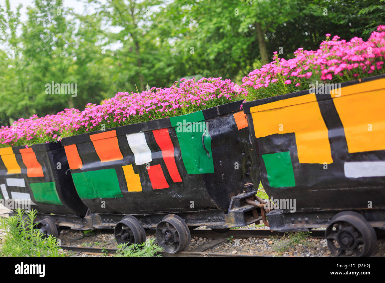 The toy train is full of flowers Stock Photo - Alamy