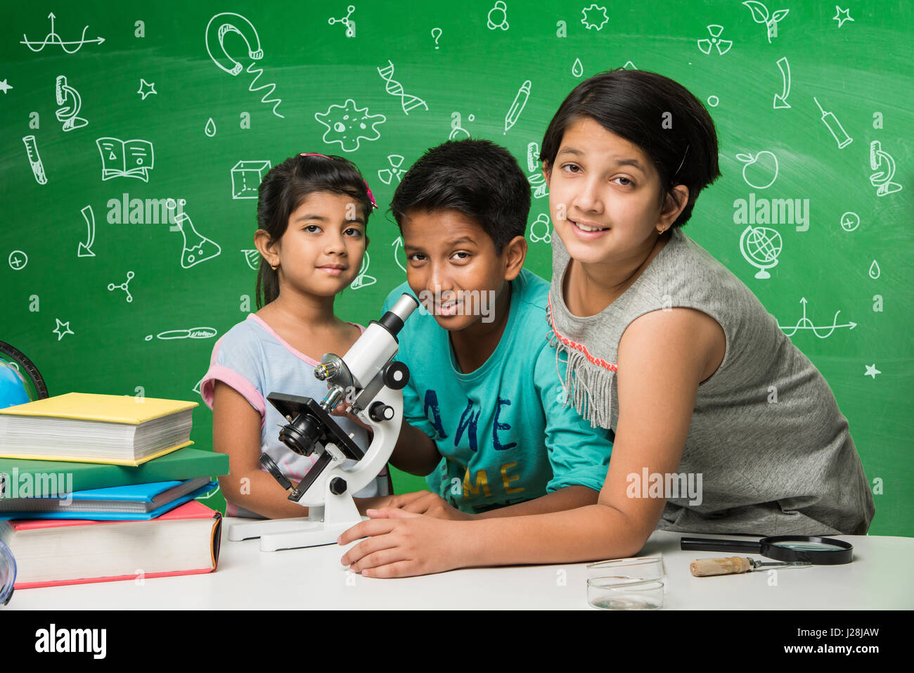 Indian kids doing science hi-res stock photography and images - Alamy