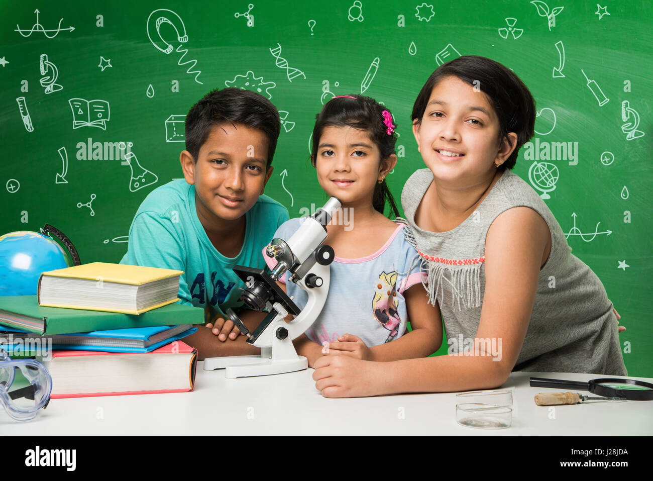 Indian kids doing science hi-res stock photography and images - Alamy