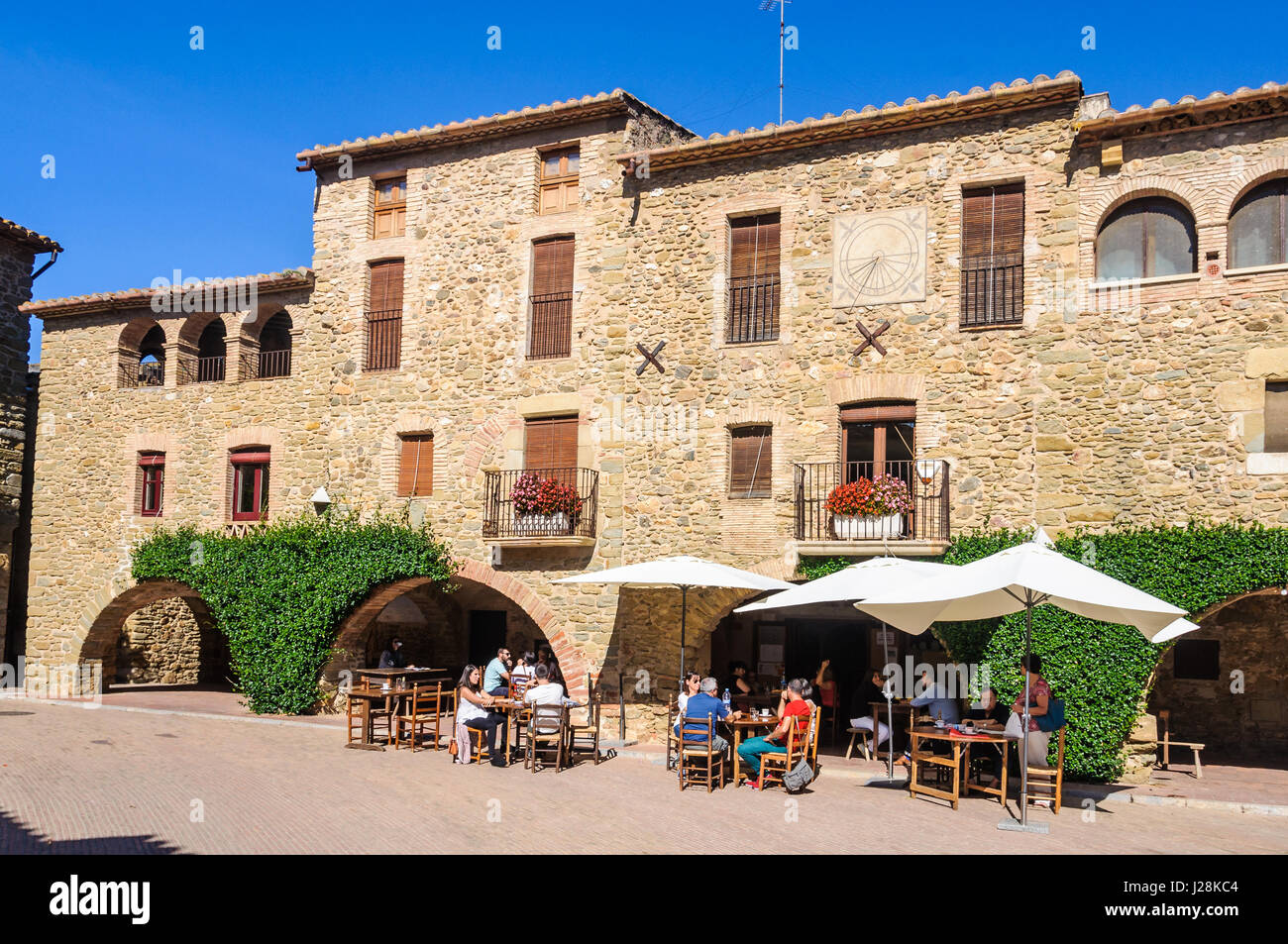 The main square in the Catalan village of Monells, Spain Stock Photo ...