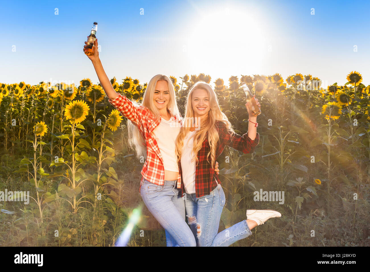 People drinking beer bottles group friends outdoor countryside ...