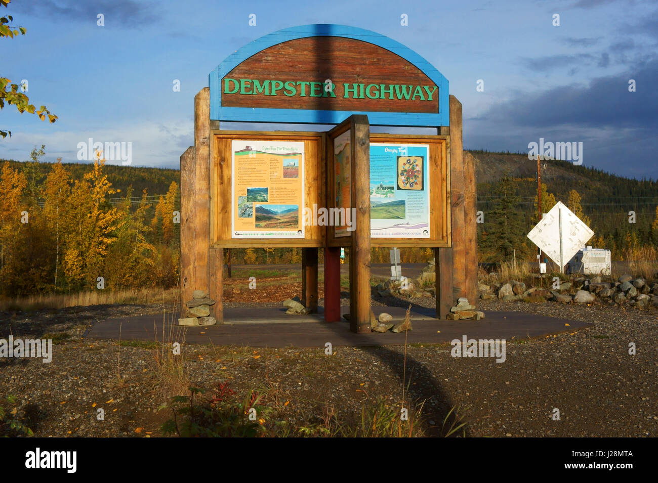 Sign marking the beginning of the Dempster Highway , Yukon. Terr ...