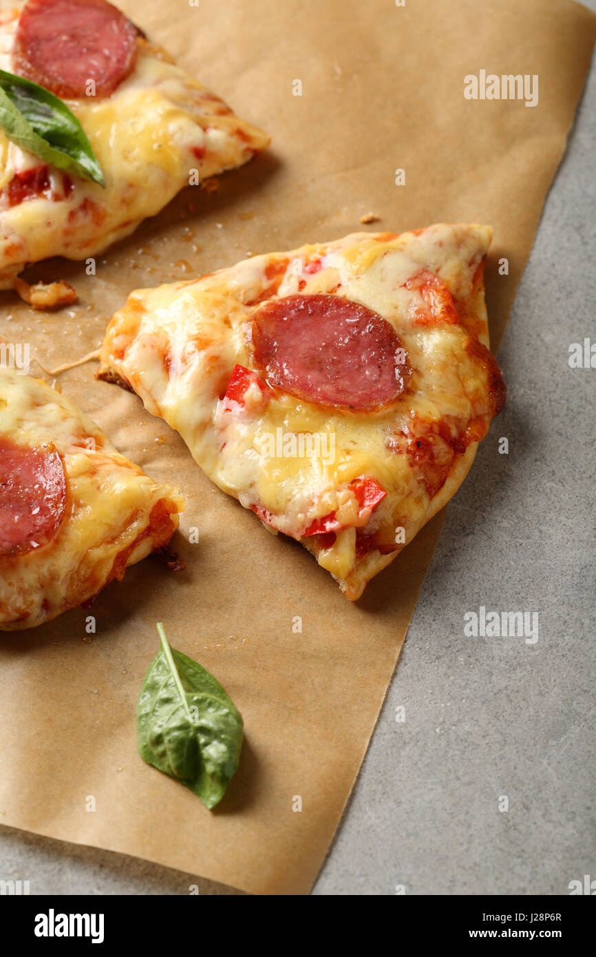 Slice of pizza closeup, italian food Stock Photo - Alamy