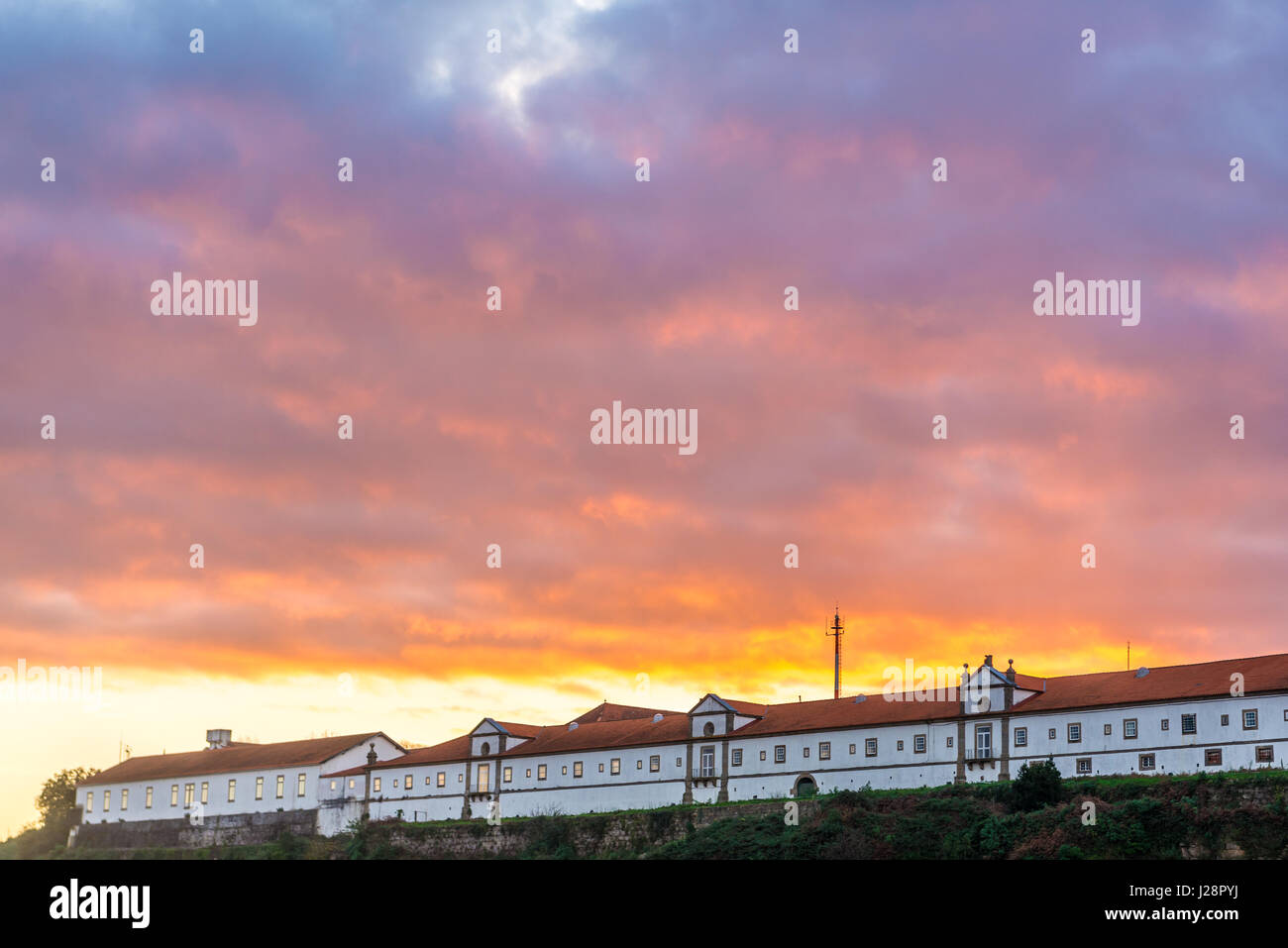 Spectacular sunrise sky above Serra do Pilar Monastery in Vila Nova de ...
