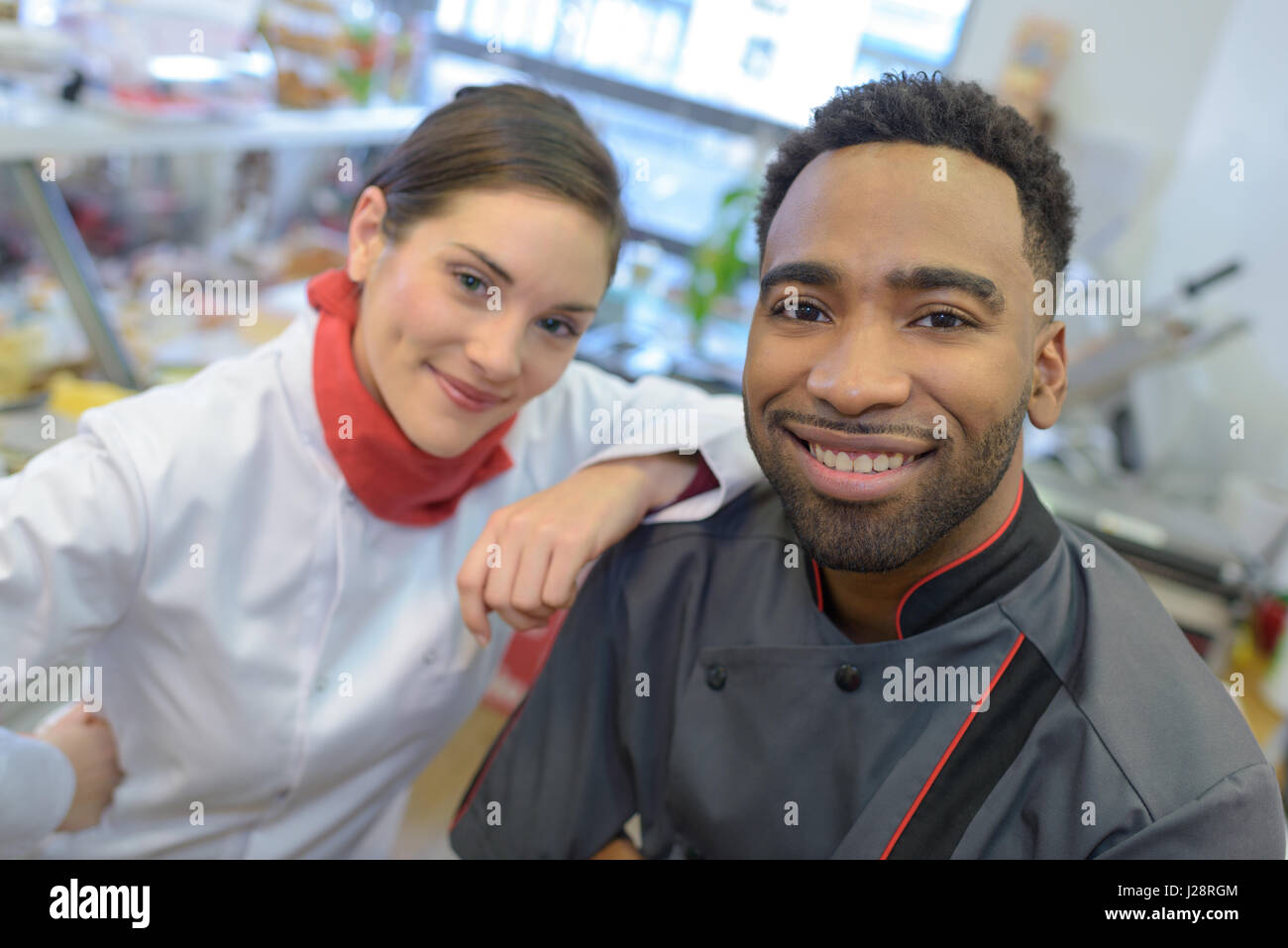 crew of professional cooks working at restaurant kitchen Stock Photo ...