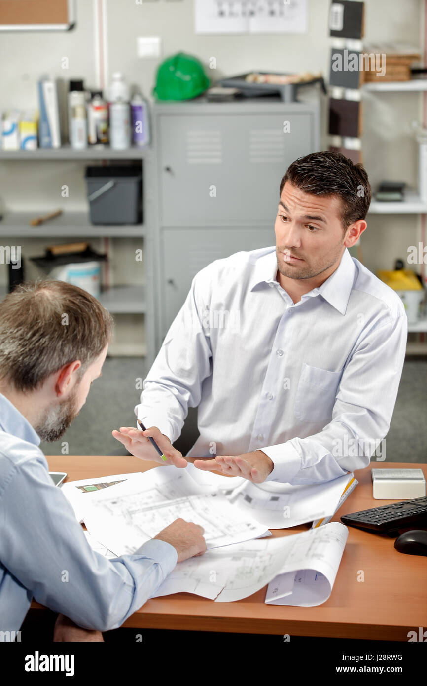 Architect getting annoyed Stock Photo - Alamy