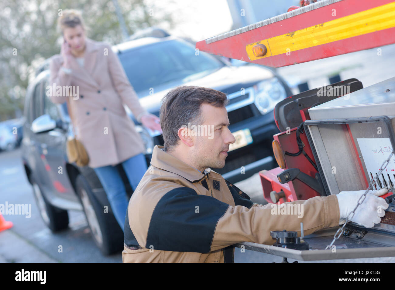 Breakdown man at work Stock Photo - Alamy