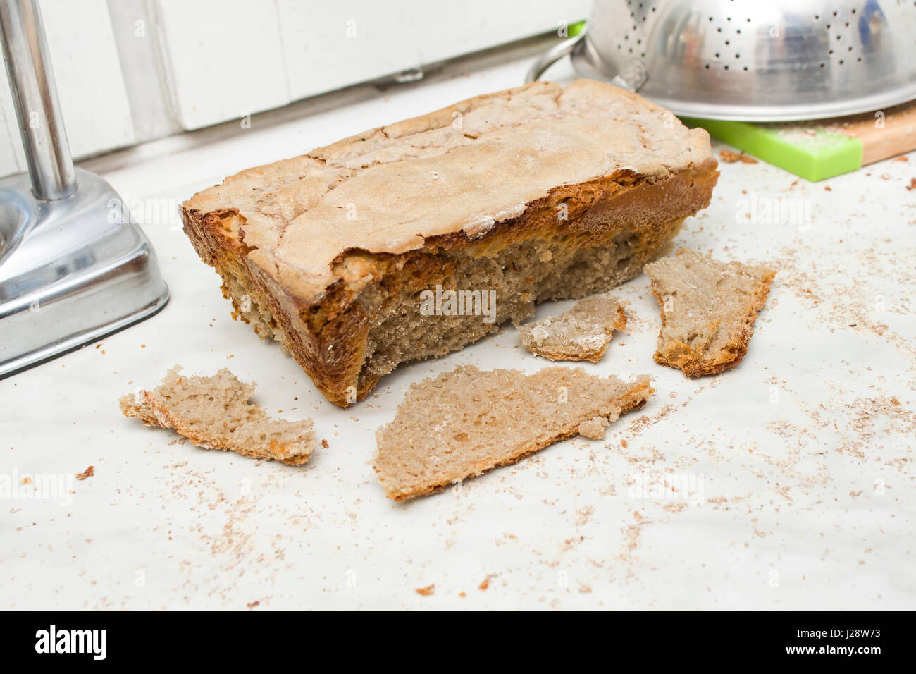 Crushed bread of your own baking on the kitchen counter. Failed baking ...