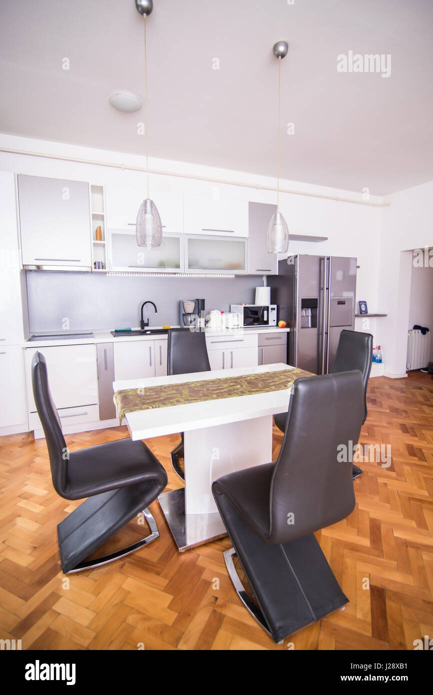 Chairs and table in a dining room Stock Photo - Alamy