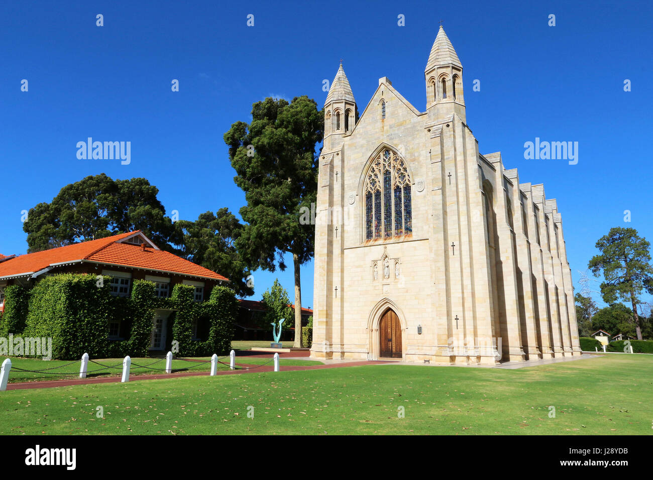 An ancient church standing on an open green field Stock Photo - Alamy