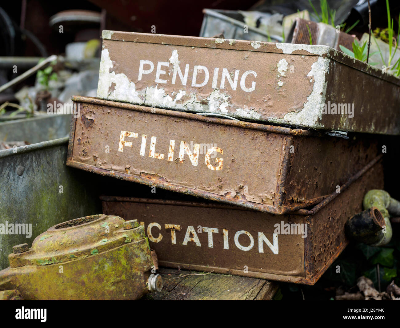 Junk the office - old metal filing trays dumped on a pile of scrap ...