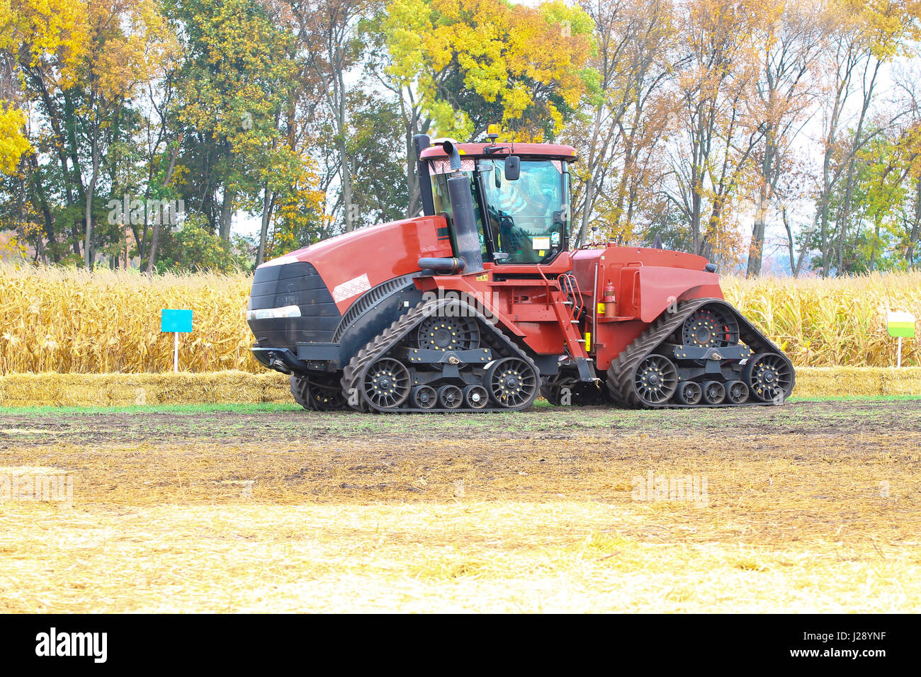 Agricultural machinery. Tractor, standing in a row Stock Photo - Alamy