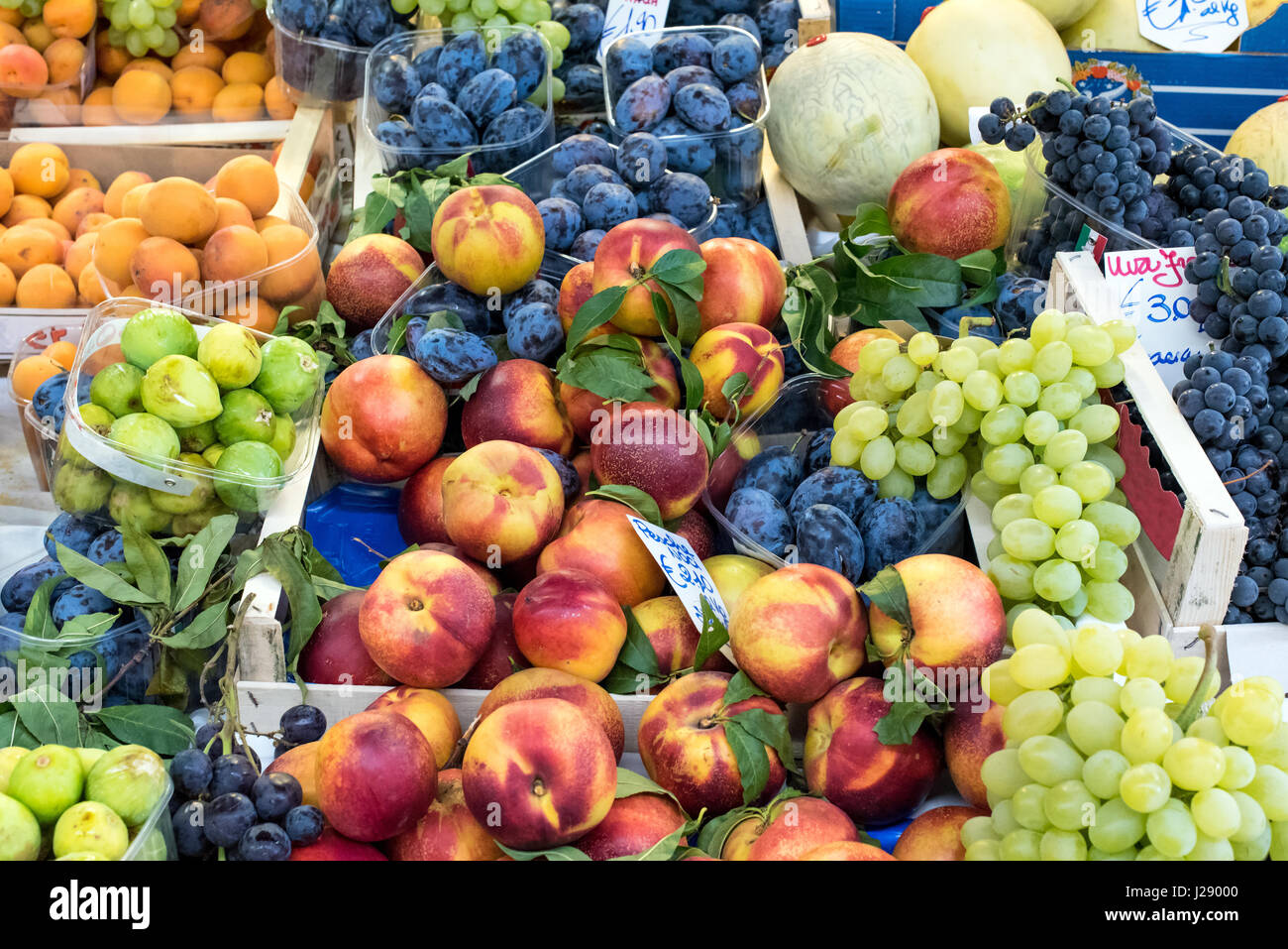 fresh fruit at a market in italy Stock Photo - Alamy