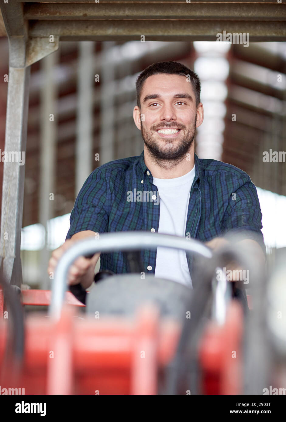 Farmer riding tractor hi-res stock photography and images - Alamy