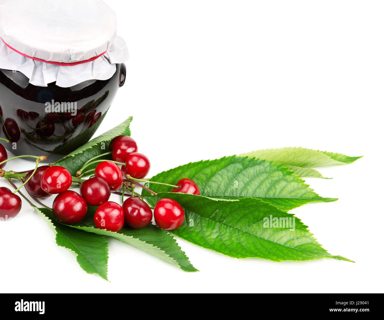 Cherry jam and cherries isolated on white background Stock Photo - Alamy
