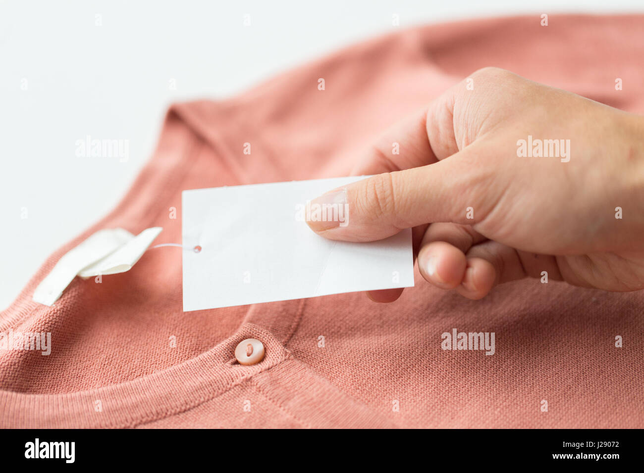 Price tag close up clothes hi-res stock photography and images - Alamy