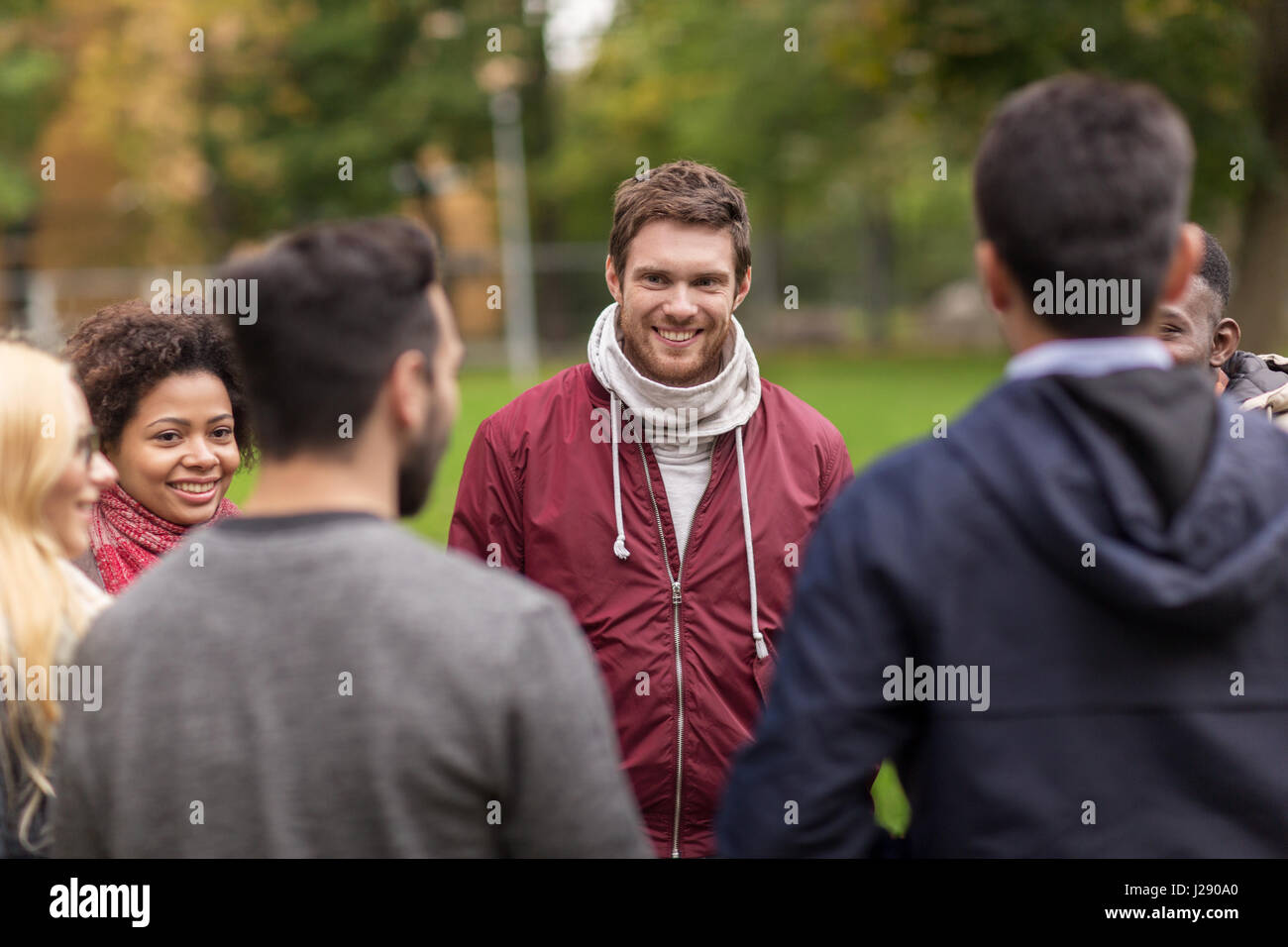 group of happy international friends outdoors Stock Photo - Alamy