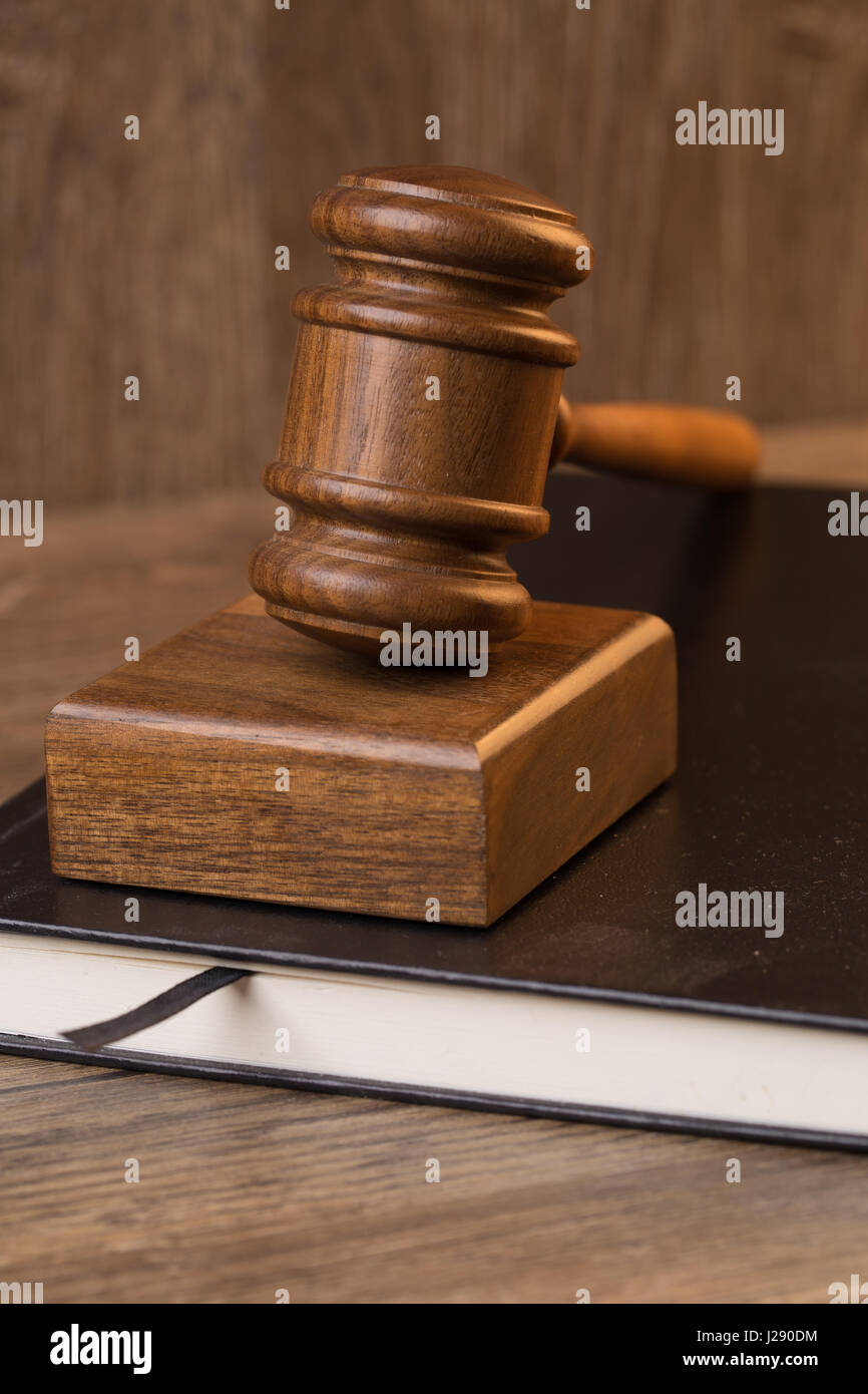 Photo of hammer on folder Stock Photo - Alamy